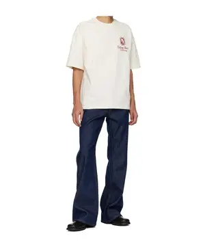 Amiri Raw Boot Cut Jeans