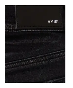 Amiri Skinny Jeans With Embroidery And Distressing