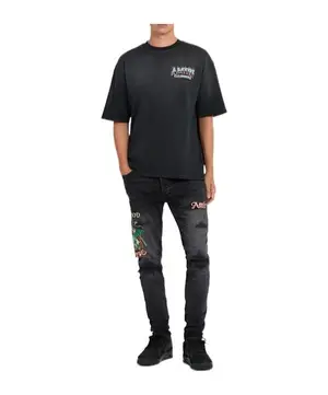 Amiri Skinny Jeans With Embroidery And Distressing