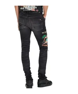 Amiri Skinny Jeans With Embroidery And Distressing