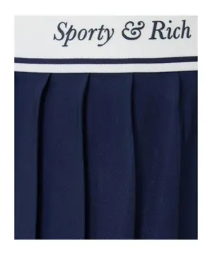 SPORTY  RICH Sporty & Rich Pleated Logo Mini Skirt