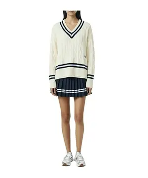 SPORTY  RICH Sporty & Rich Pleated Logo Mini Skirt