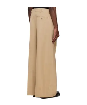 Simone Rocha Wide-leg Pleated Trousers With Faux Pearl Snaps - Sand-colored