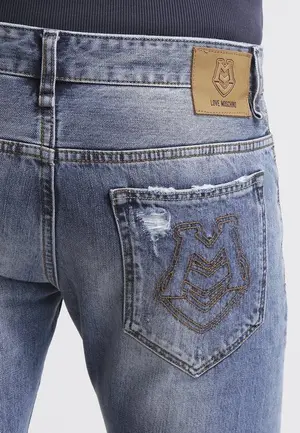 Moschino Printed Jeans With Fade Effect