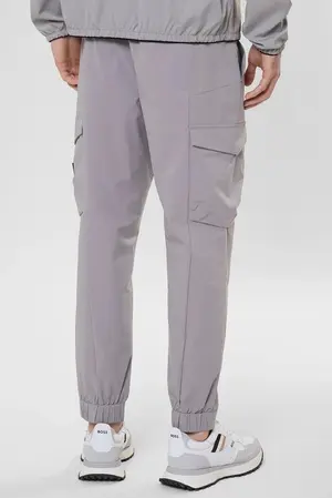 Hugo Boss Drawstring Tapered-fit Pants With Multiple Pockets And Elasticated Cuffs