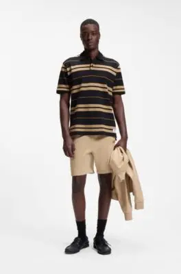 Hugo Regular-fit Polo In Cotton Pique With Engineered Stripes