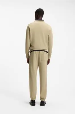 Hugo Cotton-terry Sweatpants With Logo Badge - Beige