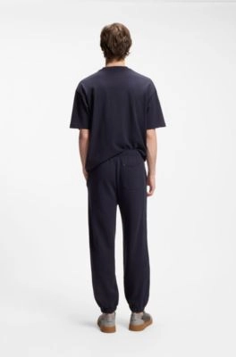 Hugo Cotton-terry Sweatpants With Logo Badge - Dark Blue