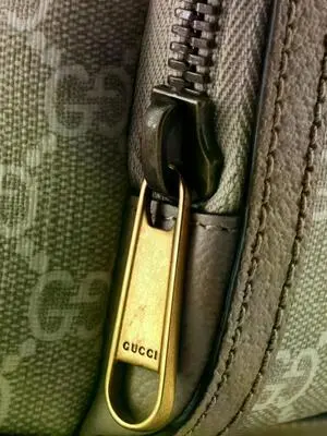 Gucci Interlocking G Patch Drawstring Flap Backpack