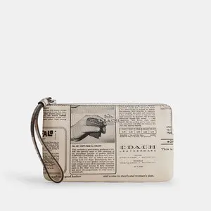 COACH OUTLET Large Corner Zip Wristlet With Newspaper Print Silver/chalk