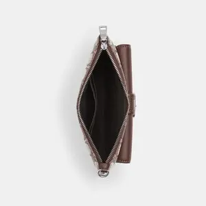 COACH OUTLET Coach Signature Jacquard Wristlet With Leather Accents - Silver/oak/maple