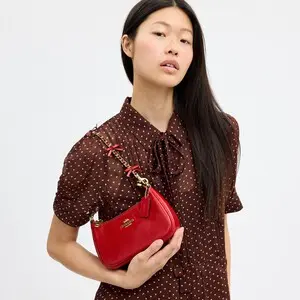 COACH OUTLET Teri Mini Crossbody Bag With Bow Detail - Gold/bright Cherry