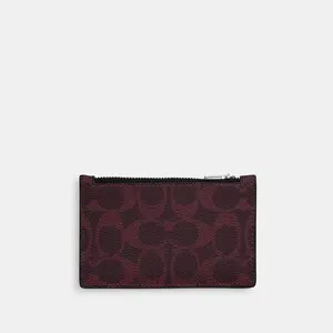 COACH OUTLET Zip Card Case In Signature Canvas - Silver/black Currant