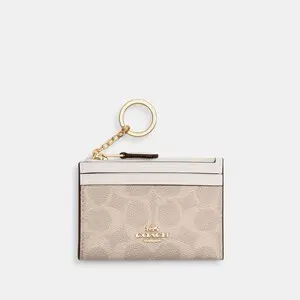 COACH OUTLET Mini Skinny Id Case In Signature Canvas - Gold/sand/chalk