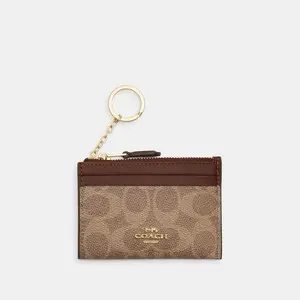 COACH OUTLET Mini Skinny Id Case In Signature Canvas - Gold/tan/brown