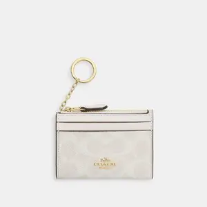 COACH OUTLET Mini Skinny Id Case In Signature Canvas - Gold/white/chalk
