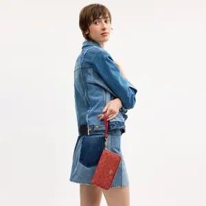 COACH OUTLET Long Zip Around Wallet In Signature Canvas - Gold/crimson