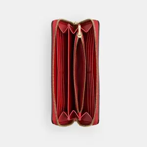 COACH OUTLET Long Zip Around Wallet In Signature Canvas - Gold/crimson