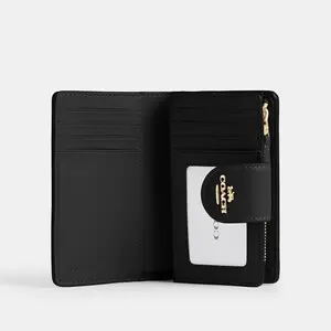 COACH OUTLET Medium Corner Zip Wallet In Signature Canvas - Gold/tan/black