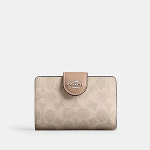 COACH OUTLET Medium Corner Zip Wallet In Signature Canvas Silver/sand/taupe