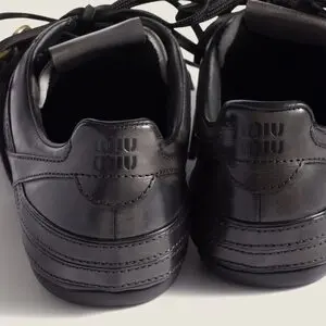 Miu Miu Leather Sneakers With Buckle Detailing