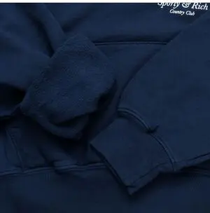 SPORTY  RICH Sporty & Rich Long Sleeve Hooded Sweatshirt