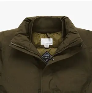 Nanamica Puffer Jacket With High Neck And Zipper Closure