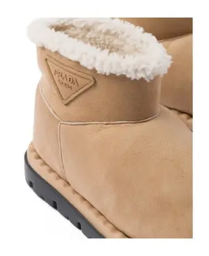 Prada Logo Triangle Round Toe Sheep Fur Boots