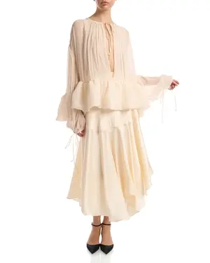 LIBEROWE Peplum Silk Blouse