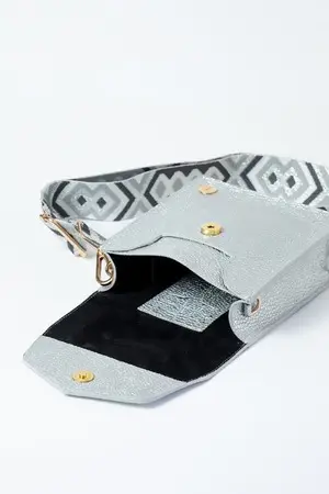 EVA INNOCENTI Patty Metallic Leather Crossbody Bag