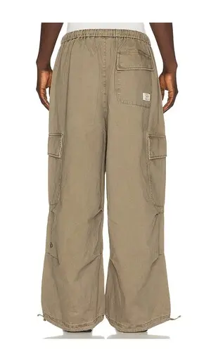 DRMERS CLUB Smiley Logo Parachute Pants