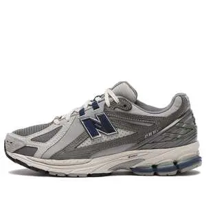 NEW BALANCE 1906r Low Top Sneakers - Gray/cream