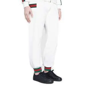 Gucci Ace Low Top Sneakers With Embossed Gg Logo