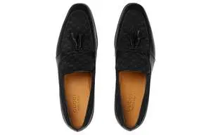 Gucci Tassel-trim Leather Loafers