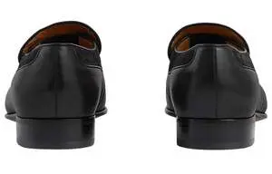 Gucci Tassel-trim Leather Loafers