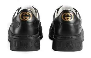Gucci Gg Embossed Leather Lace-up Sneakers - Black