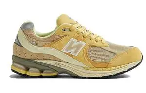 NEW BALANCE X Auralee 2002r Sneakers - Yellow