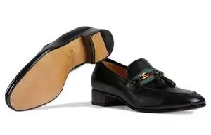 Gucci Interlocking G Tassel Leather Loafers