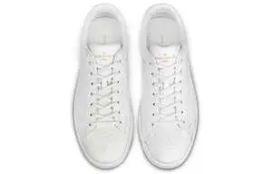 LOUIS VUITTON Luxembourg Monogram Embossed Leather Sneakers