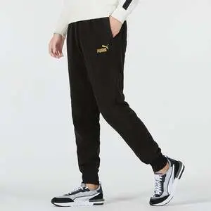 PUMA Ess+ Tape Golden! Track Pants Logo