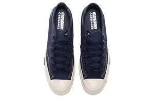 CONVERSE X Undefeated Chuck 70 Mid Top Sneakers