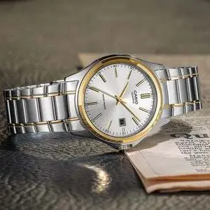 Casio Stainless Steel And Gold-tone Link Watch With Quartz Movement