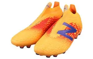NEW BALANCE Tekela V3+ Pro Ag - Orange/blue/red