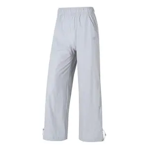 NEW BALANCE Woven Pants Asia Sizing - Grey