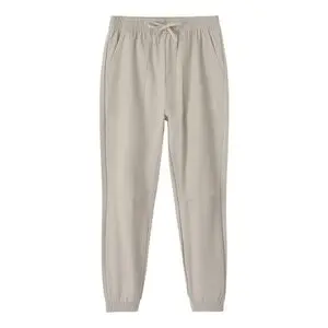 NEW BALANCE Essentials Stacked Sweatpants Asia Sizing - Beige