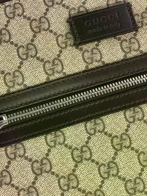 Gucci Gg Coated Canvas Messenger Bag