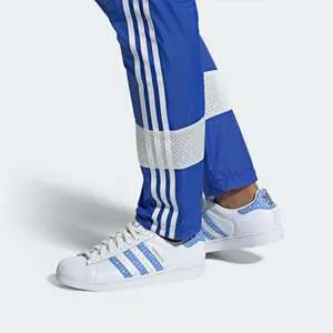 Adidas Superstar Low Top Sneakers With Blue Logo Print