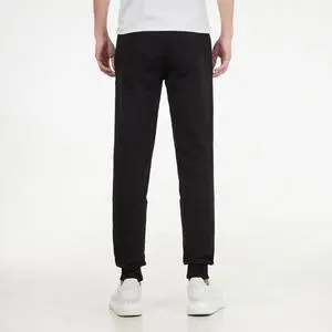 PUMA Classics Graphics Brand Love Placement Pants Tr