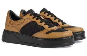 Gucci Gg Embossed Lace Up Sneakers