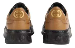 Gucci Gg Embossed Lace Up Sneakers